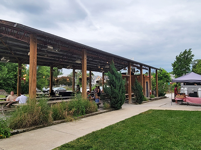 The outdoor setup at Eli's BBQ feels like stumbling upon a backyard cookout where everyone's invited. Those string lights aren't just for show&mdash;they're beacons guiding hungry souls home.