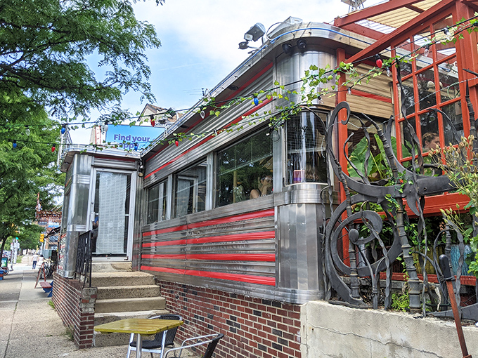 The gleaming stainless steel exterior of Silk City stands like a time capsule in Philadelphia's Northern Liberties, its red stripes promising retro delights within.