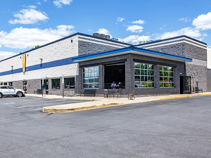 The unassuming exterior of Pizza Boy Brewing in Enola hides a beer lover's paradise. Those gleaming tanks aren't just for show—they're working overtime on liquid happiness.
