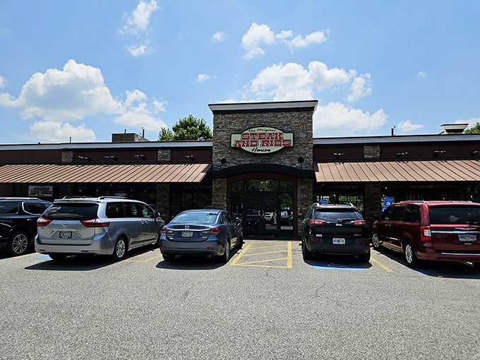 Stone facade and brown awnings promise no-nonsense dining. Like a culinary speakeasy, this unassuming exterior hides flavor treasures waiting to be discovered.