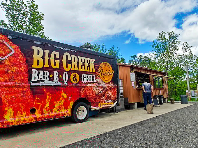 The flame-wrapped food truck announces its presence like a barbecue beacon. No fancy frills needed when the food does all the talking.