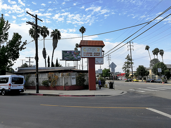 The Spanish-style exterior of Pat & Lorraine's welcomes hungry patrons with its terracotta roof and charming red door&mdash;a humble facade hiding breakfast greatness within.