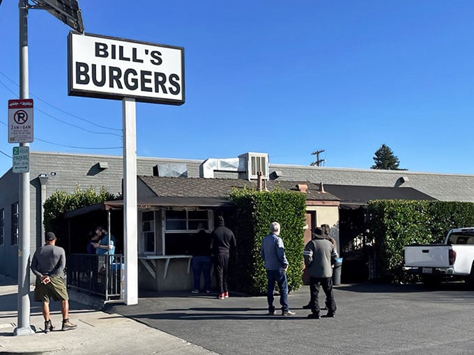 The unassuming exterior of Bill's Burgers stands as a time capsule of old California, where culinary treasures hide in plain sight.