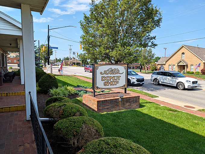 The brick exterior of Bill's Donut Shop stands like a humble temple to fried dough, promising sweet salvation inside.