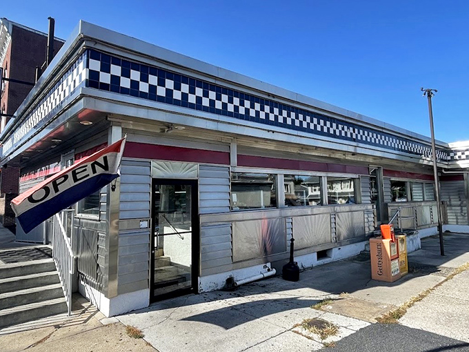 The classic black and white checkered trim of Lincoln Diner beckons hungry travelers like a culinary lighthouse on Gettysburg's Carlisle Street.