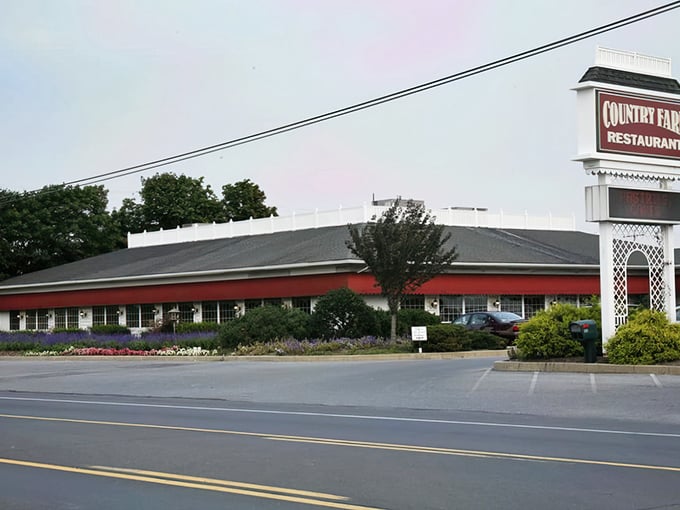 Those burgundy awnings aren't just decoration - they're a beacon calling hungry travelers to Pennsylvania comfort food paradise.