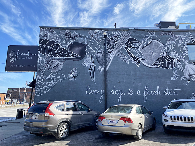 The blue-gray brick building with its striking botanical mural isn't just eye-catching—it's a beacon of hope and really good avocado toast in downtown Columbus.