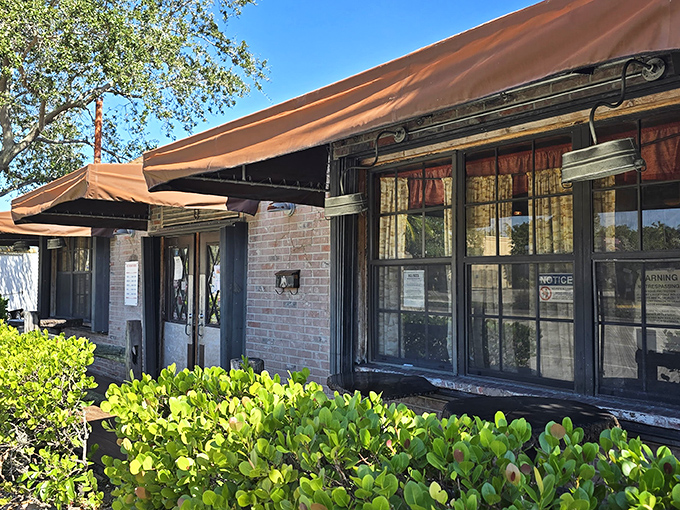 The unassuming brick fortress of flavor that is Tom Jenkins' Bar-B-Q. No fancy frills needed when the smoke signals speak for themselves.