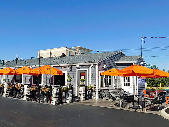 The unassuming gray exterior with vibrant orange umbrellas is like Cincinnati's version of a culinary mullet&mdash;business on the outside, party on the inside.