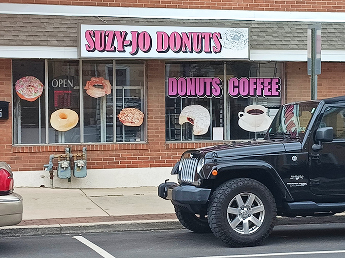The pink sign beckons like a lighthouse for the sugar-deprived. Suzy-Jo's storefront promises simple pleasures in a world of complicated everything.