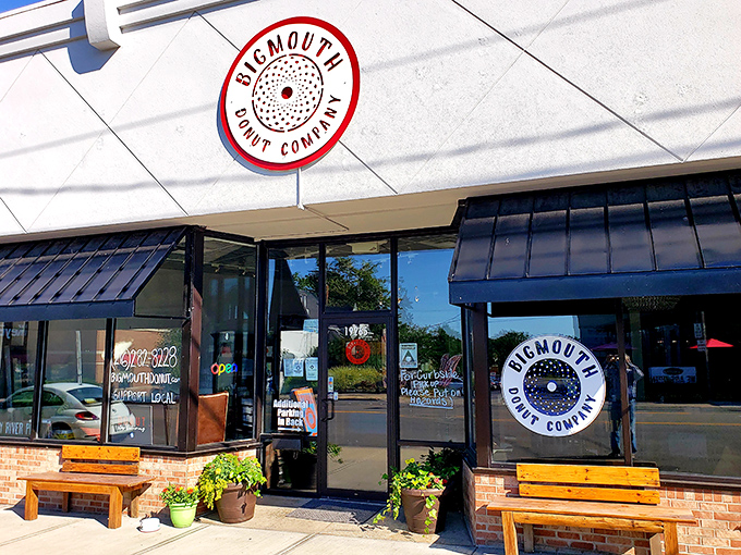 The unassuming storefront of Bigmouth Donut Company beckons with its clean lines and rustic wooden benches&mdash;a temple of fried dough hiding in plain sight.