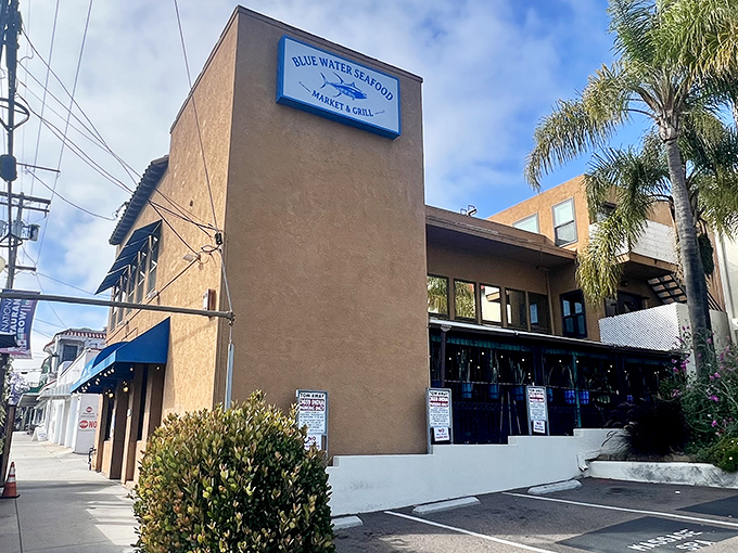 The unassuming exterior of Blue Water Seafood hides culinary treasures within. Like finding a pearl in an oyster, this modest storefront delivers oceanic delights beyond its simple fa&ccedil;ade.