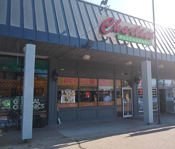 The iconic red script of Charlie's Restaurant beckons from its Madison Heights strip mall home, promising diner delights that transcend the humble surroundings.