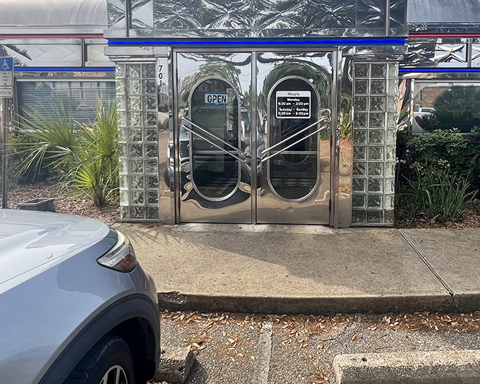 The exterior promises exactly what it delivers: authentic diner magic wrapped in chrome and nostalgia.