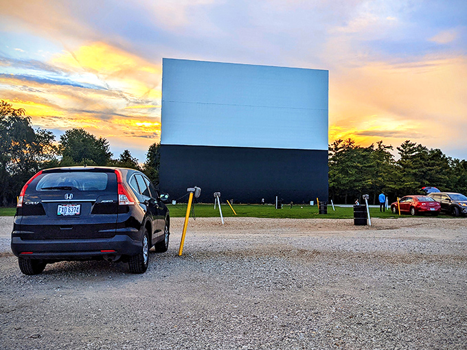 That magical moment when the screen awaits its first flicker of light against an Ohio sunset, promising an evening of cinematic wonder.