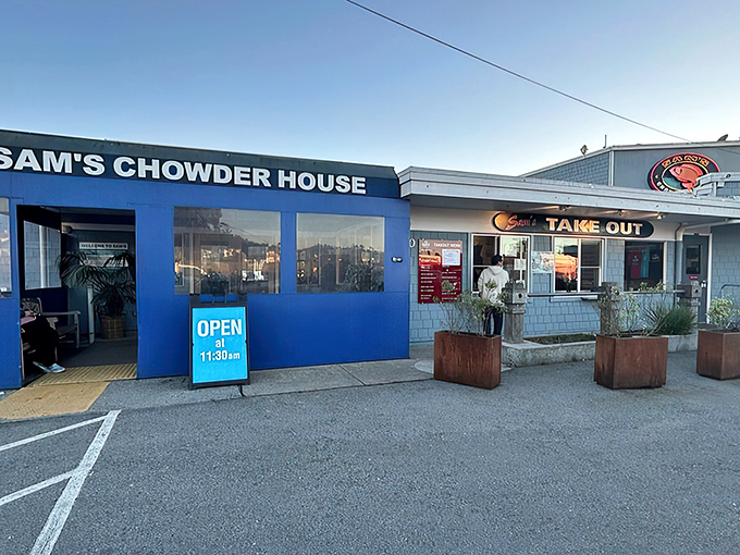 The iconic blue exterior of Sam's Chowder House stands like a beacon of seafood salvation on the Half Moon Bay coastline.