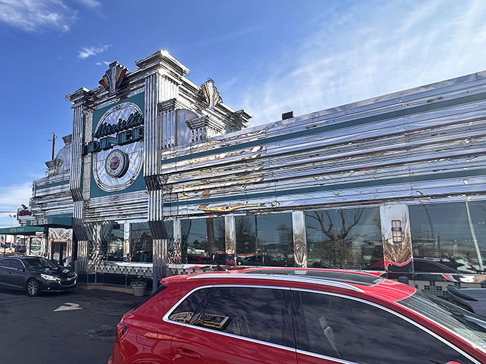The classic chrome-and-neon exterior of Marietta Diner glows like a beacon for hungry travelers, promising comfort food salvation 24 hours a day.