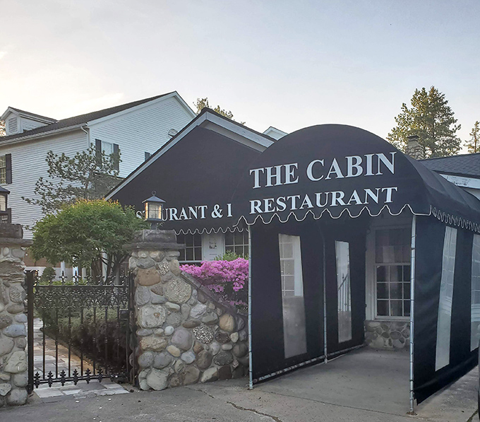 The unassuming exterior of The Cabin belies the culinary magic happening inside. Like finding a secret clubhouse for grown-ups with excellent taste.