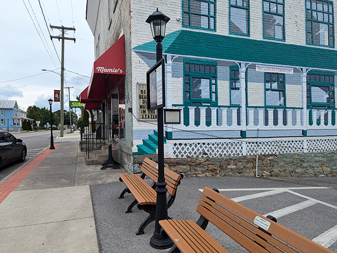 The historic white brick building with teal accents stands as Martinsburg's breakfast beacon, promising comfort food and small-town charm inside those welcoming walls.