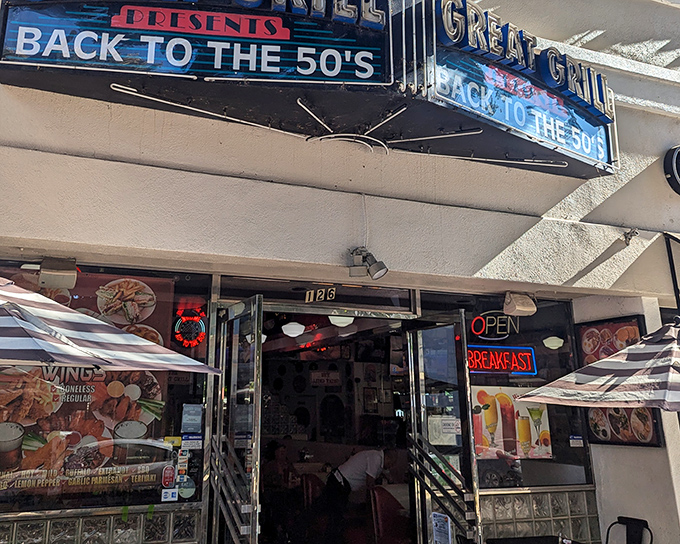The neon promise of "BACK TO THE 50'S" isn't just signage&mdash;it's a time machine disguised as a Burbank storefront, beckoning hungry time travelers.