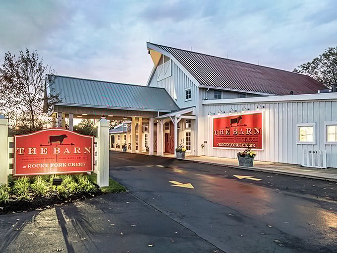 The classic white barn exterior with bold red signage isn't just Instagram-worthy&mdash;it's the architectural equivalent of a warm welcome to your taste buds.