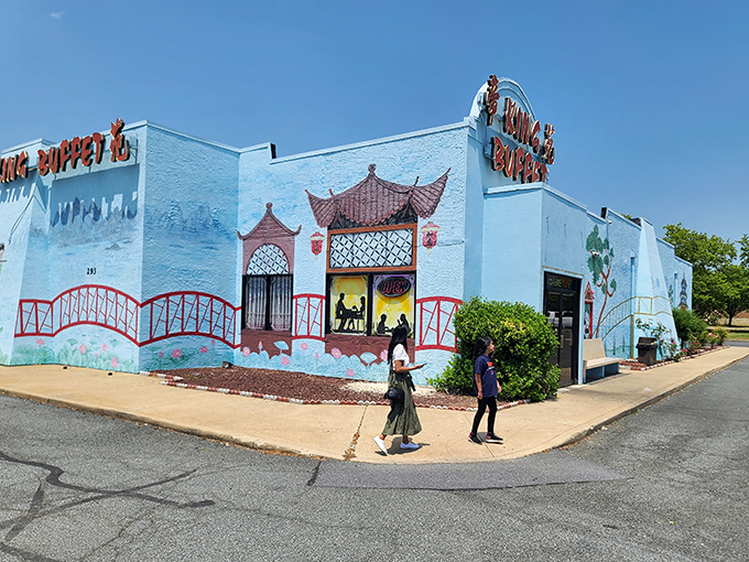The vibrant blue exterior of King Buffet stands out like a culinary oasis in Dover, its painted landscape promising Eastern delights within.