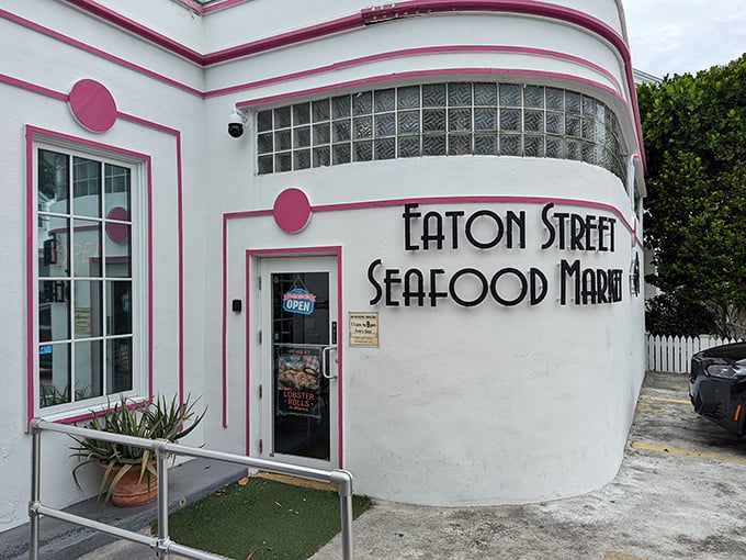 The Art Deco curves and pink trim of Eaton Street Seafood Market stand out like a stylish 1930s starlet who happens to serve incredible seafood.