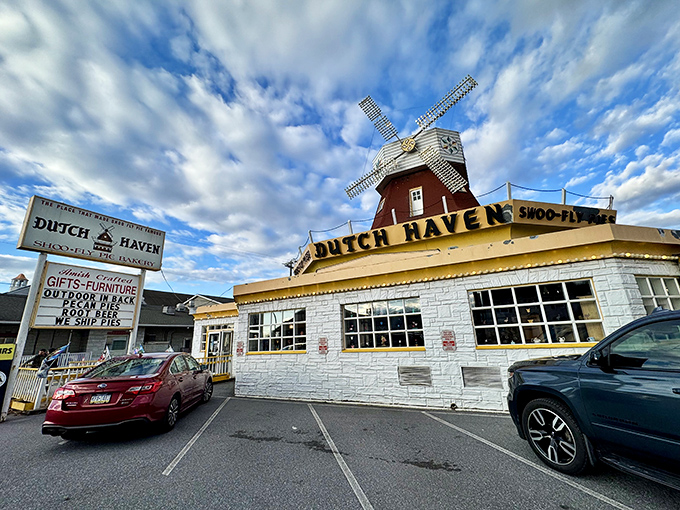 The iconic windmill atop Dutch Haven stands like a beacon of sweetness on Route 30, promising pie paradise to all who approach.