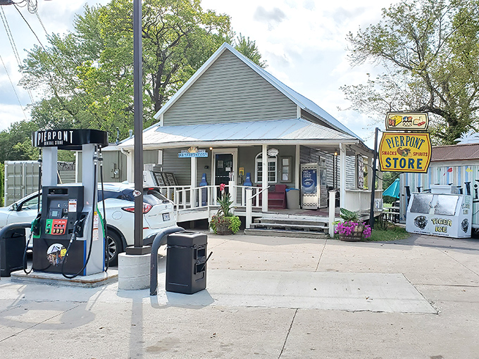 The wooden pergola and hanging flower baskets aren't trying to impress anyone—they're just being their authentic, charming Missouri self. Pure roadside magic.