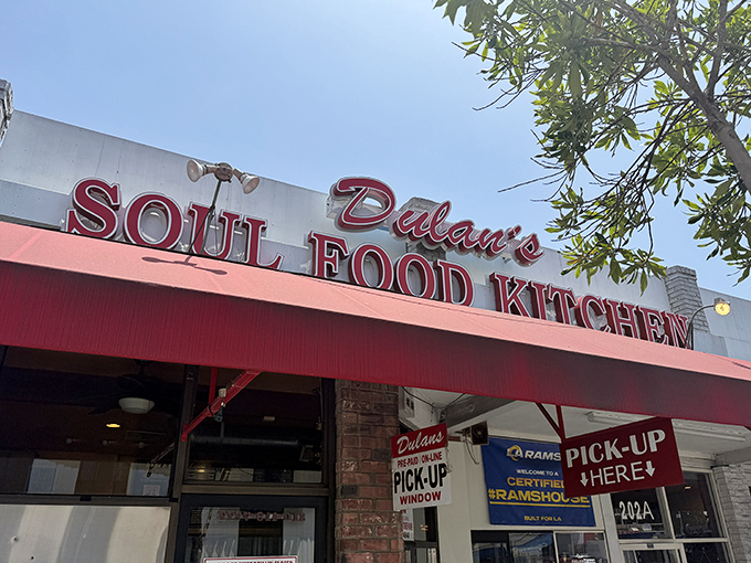 The red awning beckons like a culinary lighthouse on Manchester Boulevard&mdash;this is where soul food dreams come true in Inglewood.