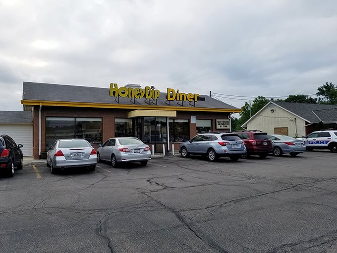 The yellow sign beckons like a lighthouse for the breakfast-deprived. Honey Dip's unassuming exterior hides Columbus's best-kept morning secret.