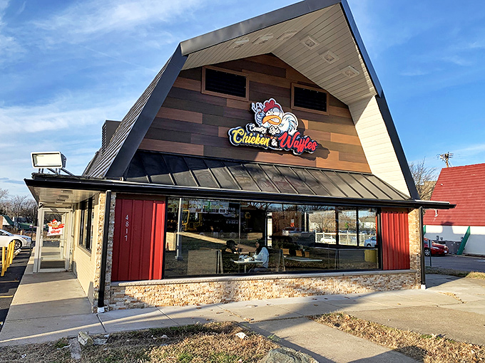The A-frame architecture isn't just eye-catching—it's a beacon of comfort food promise. That wooden exterior practically whispers, "Come in, get comfortable, leave full."