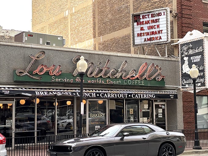 The iconic neon sign beckons hungry Chicagoans like a breakfast lighthouse. Lou Mitchell's has been the starting point of Route 66 adventures and downtown mornings for generations.