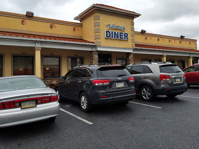 The golden exterior of Folcroft Diner beckons like a beacon of breakfast hope. Even on cloudy days, this Delaware County institution promises sunshine on a plate.