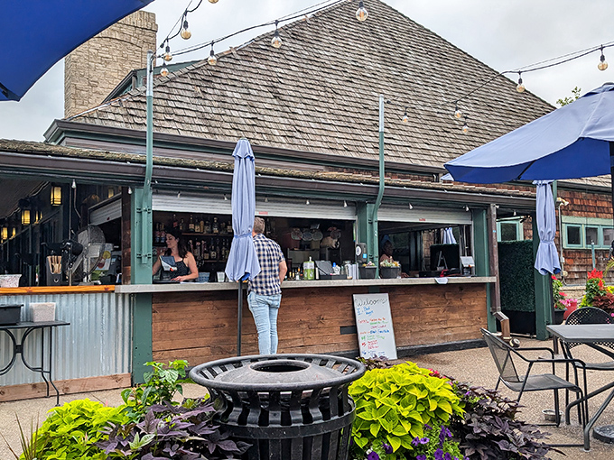 The shingled roof and rustic charm of The Boathouse beckons like an old friend, promising good times and even better meals by the water.