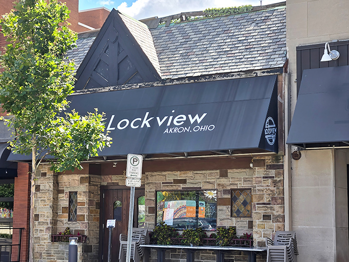 The stone facade of The Lockview stands like a culinary fortress in downtown Akron, promising comfort food treasures behind its unassuming exterior.