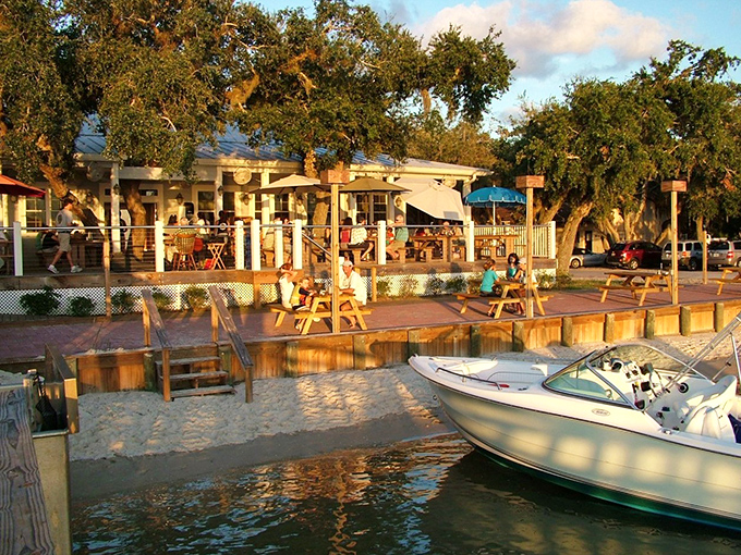A Southern welcome if there ever was one! Aunt Kate's charming exterior beckons with its wraparound porch and oak-shaded entrance, promising comfort before you even reach the door.
