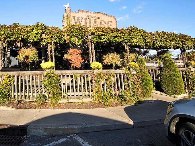 Nature's own decorator has transformed this waterfront gem into a living greenhouse. The vine-covered patio practically whispers "come sit awhile" to passersby.