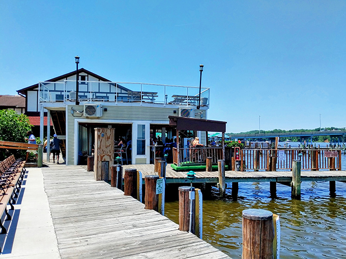 Mike's iconic waterfront presence beckons both boaters and landlubbers alike. That red sign might as well say "Seafood Paradise Ahead."