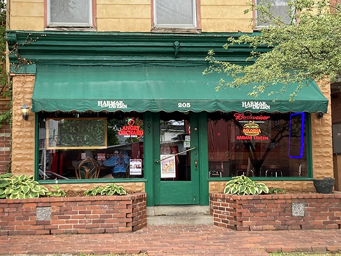 The unassuming yellow exterior with its emerald green awning doesn't scream "culinary destination," but that's exactly what makes this Marietta gem so special.