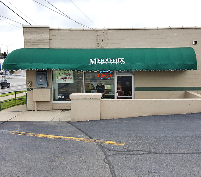 The emerald green awning of Mehaffie's Pies stands like a beacon of hope for dessert lovers. Simple exterior, extraordinary treasures within.