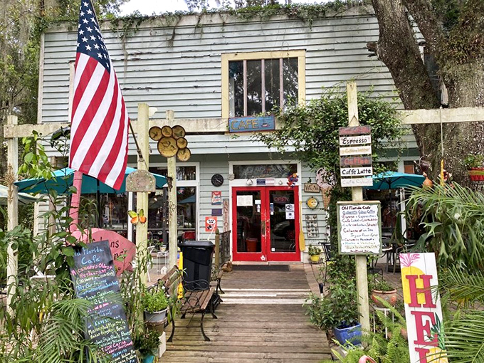 The mint-green exterior with its vibrant red door isn't just inviting&mdash;it's practically shouting "Get in here and eat something delicious!" through the Spanish moss.