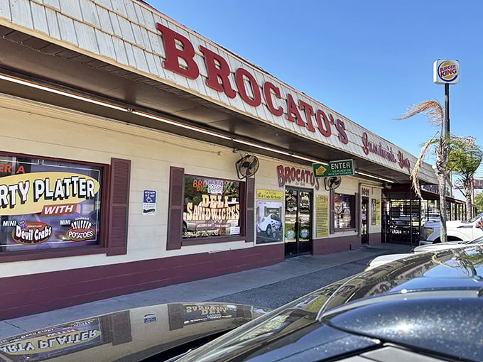 The iconic red lettering of Brocato's beckons hungry travelers like a lighthouse for sandwich lovers. Tampa's culinary landmark stands unpretentious yet proud.