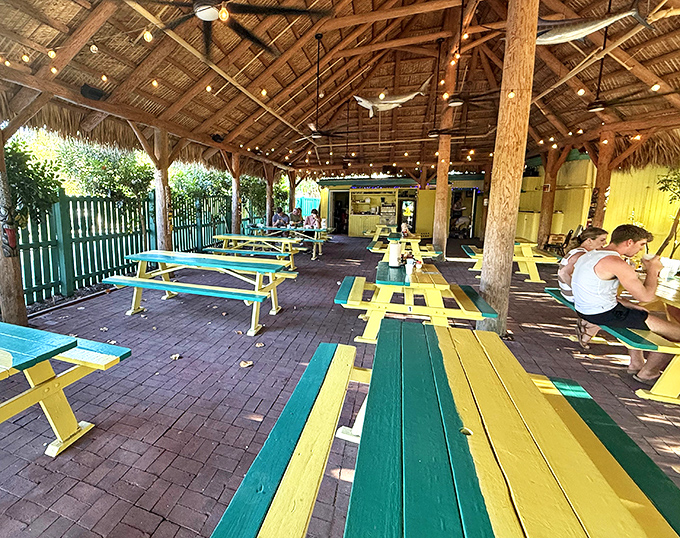 Beneath a breezy thatched roof, No Name Pub&rsquo;s yellow-and-green picnic tables and twinkling string lights welcome you to the kind of island hideaway that&rsquo;s worth every mile of the journey.