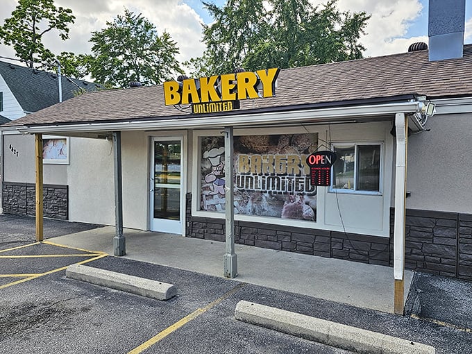The bright yellow sign of Bakery Unlimited beckons like a sugary lighthouse on Toledo's horizon. Sweet salvation awaits inside!
