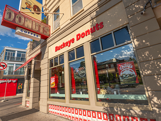 The iconic Buckeye Donuts storefront stands like a beacon of sugary hope on High Street, promising sweet salvation to hungry Ohioans 24/7.