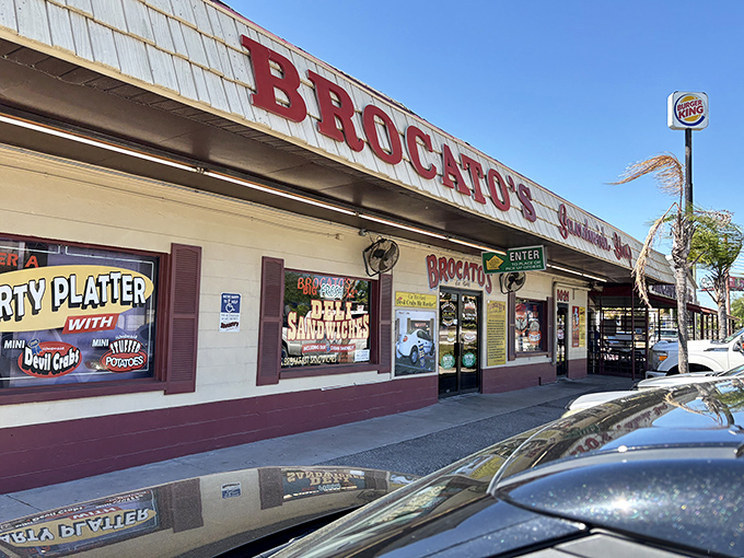 The iconic red lettering of Brocato's beckons hungry travelers like a lighthouse for sandwich lovers. Tampa's culinary landmark stands unpretentious yet proud.