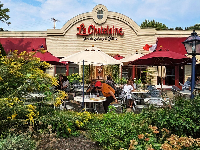 That iconic red signage against cream-colored stone isn't just curb appeal&mdash;it's a promise of Parisian delights hiding in plain sight in Columbus.