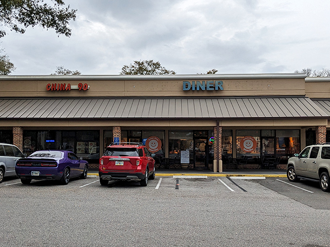The iconic green sign welcomes hungry travelers to DeBary Diner, where outdoor seating offers a perfect perch for people-watching between bites of comfort food.