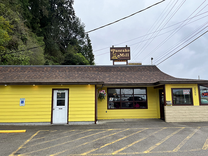 The sunshine-yellow exterior of Pancake Mill stands like a breakfast beacon on Oregon's coast. No architectural awards here&mdash;just the promise of pancake perfection inside.